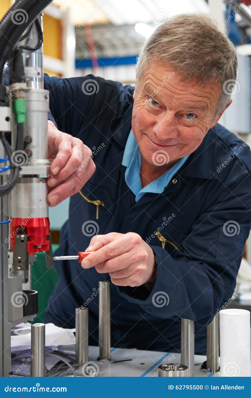 Engineer Working on Machine in Factory Stock Photo - Image of human ...