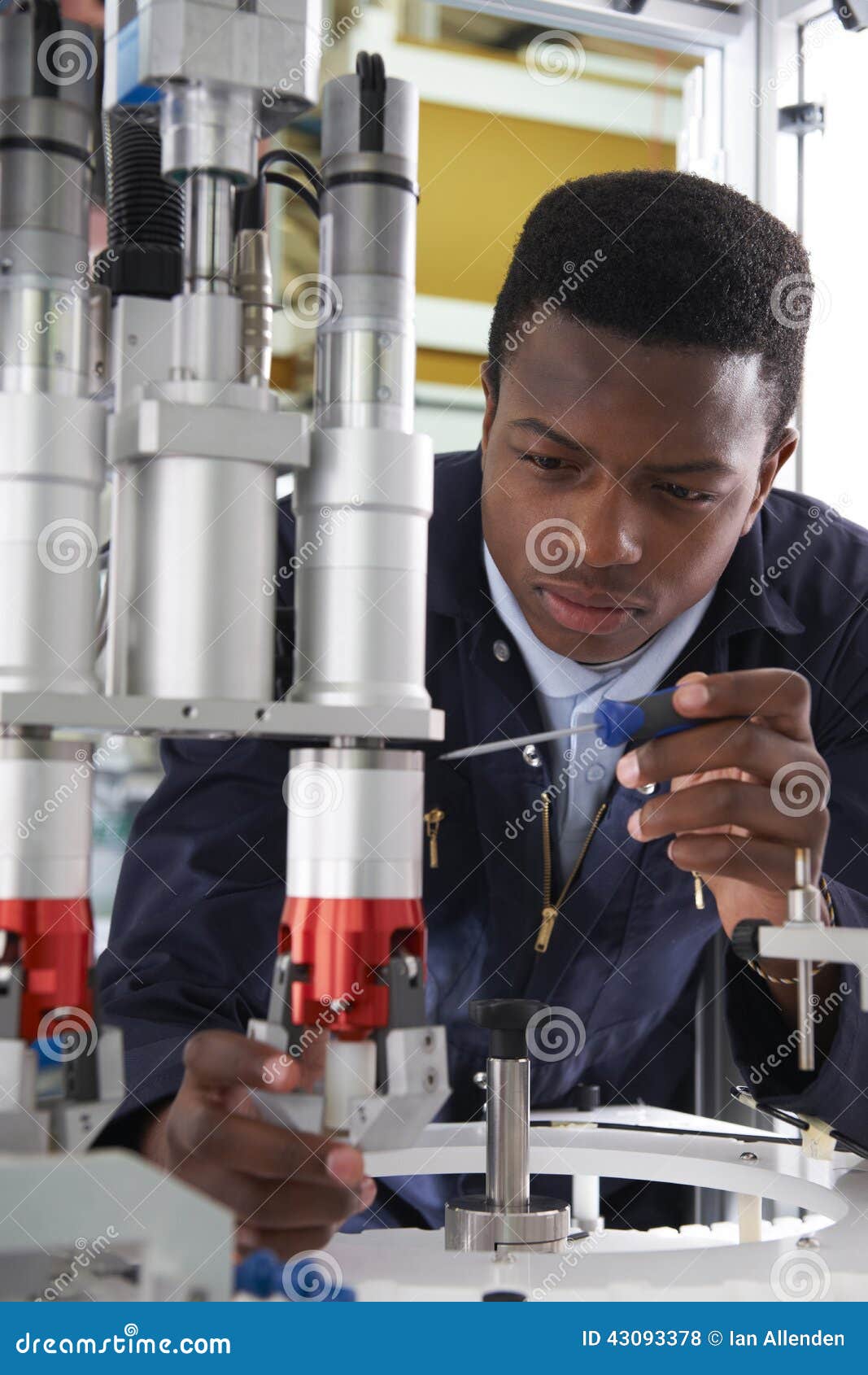 Engineer Working on Machine in Factory Stock Photo - Image of ...