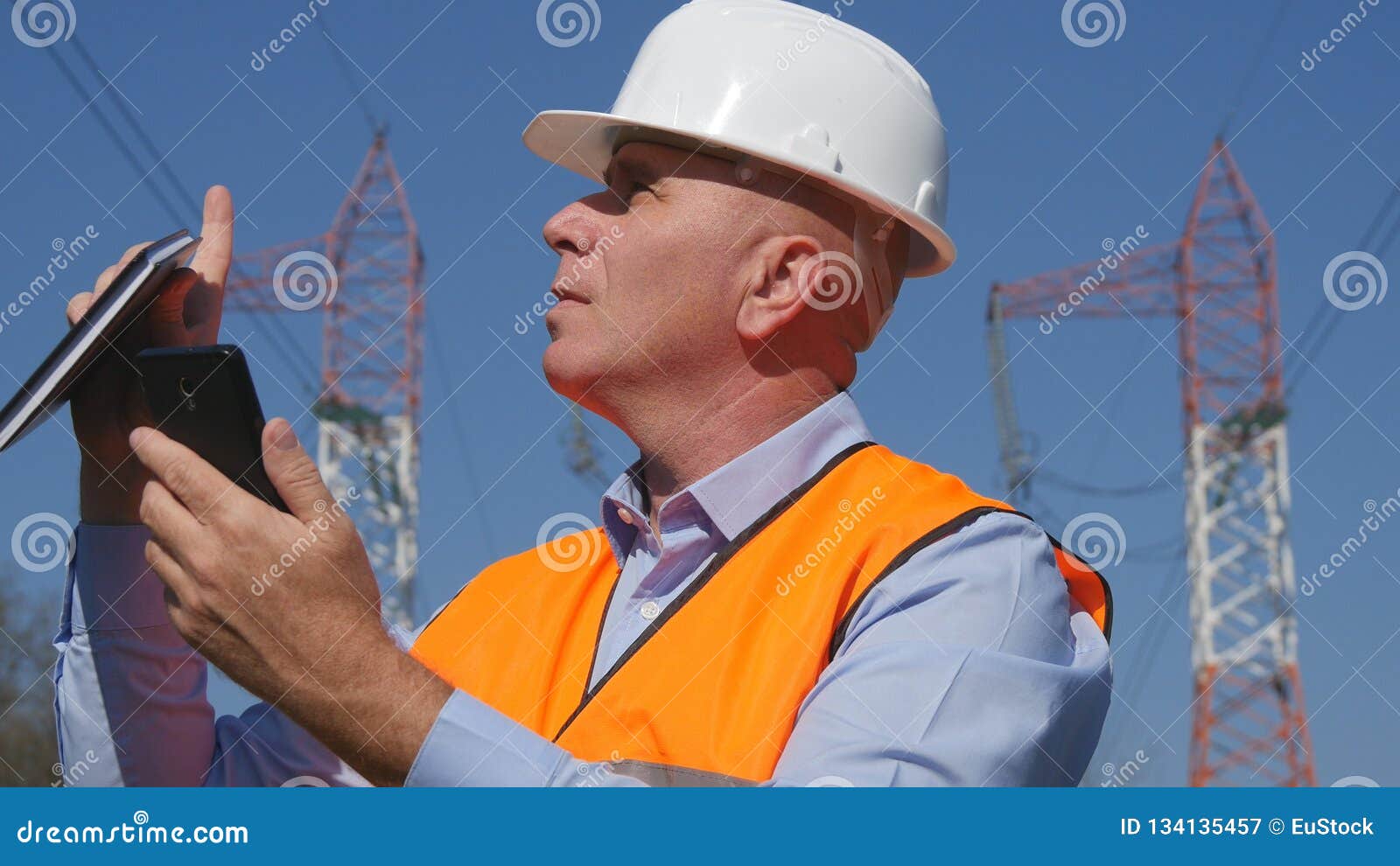 Engineer Working in Maintenance Using Cell Phone Communication Stock ...