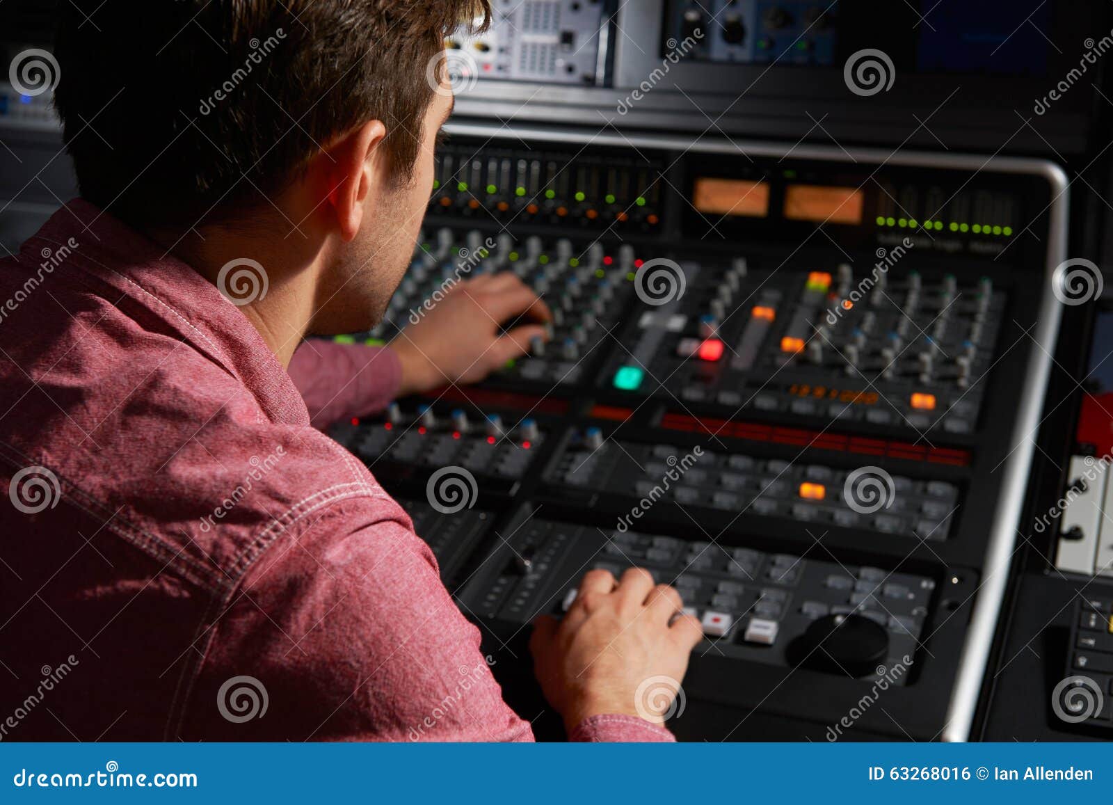 Engineer Working at Mixing Desk in Recording Studio Stock Photo - Image ...