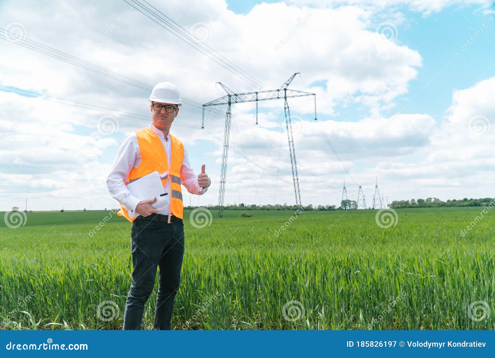 Engineer Working Near Transmission Lines. Electrical Engineer Checks ... Engineer Working Near Transmission Lines. Electrical Engineer Checks ...