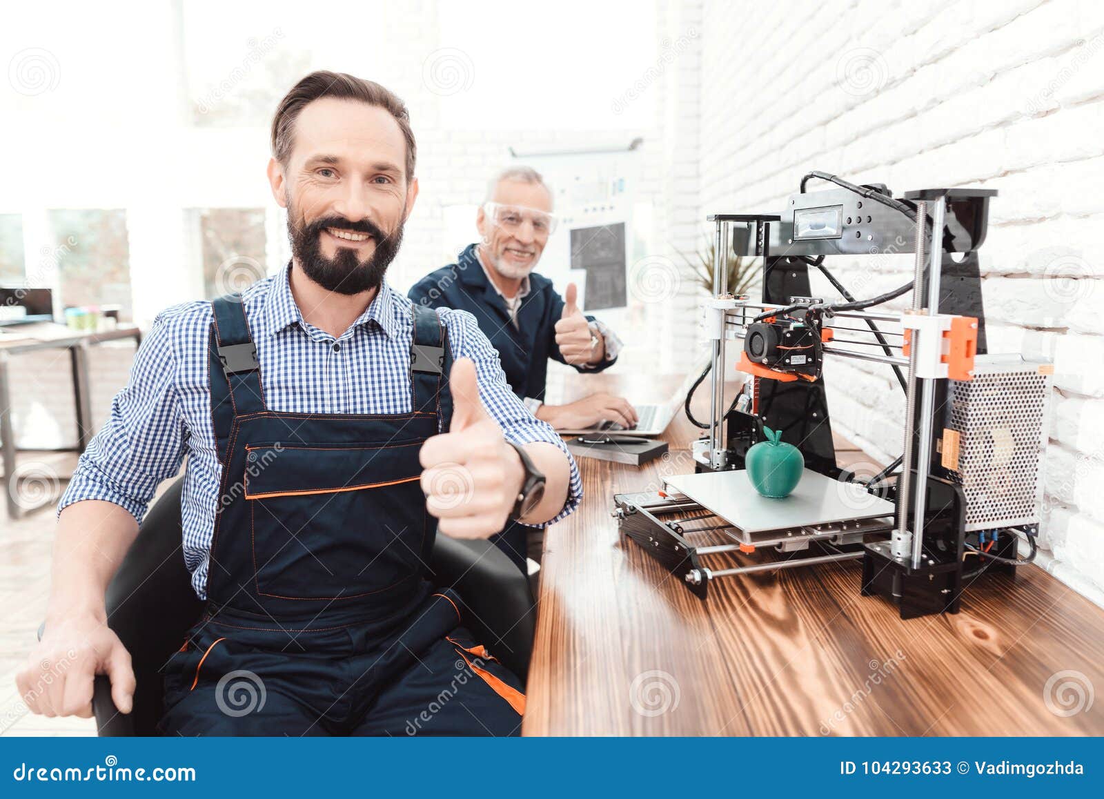 An Engineer in a Working Overall Posing in a Technical Laboratory ...