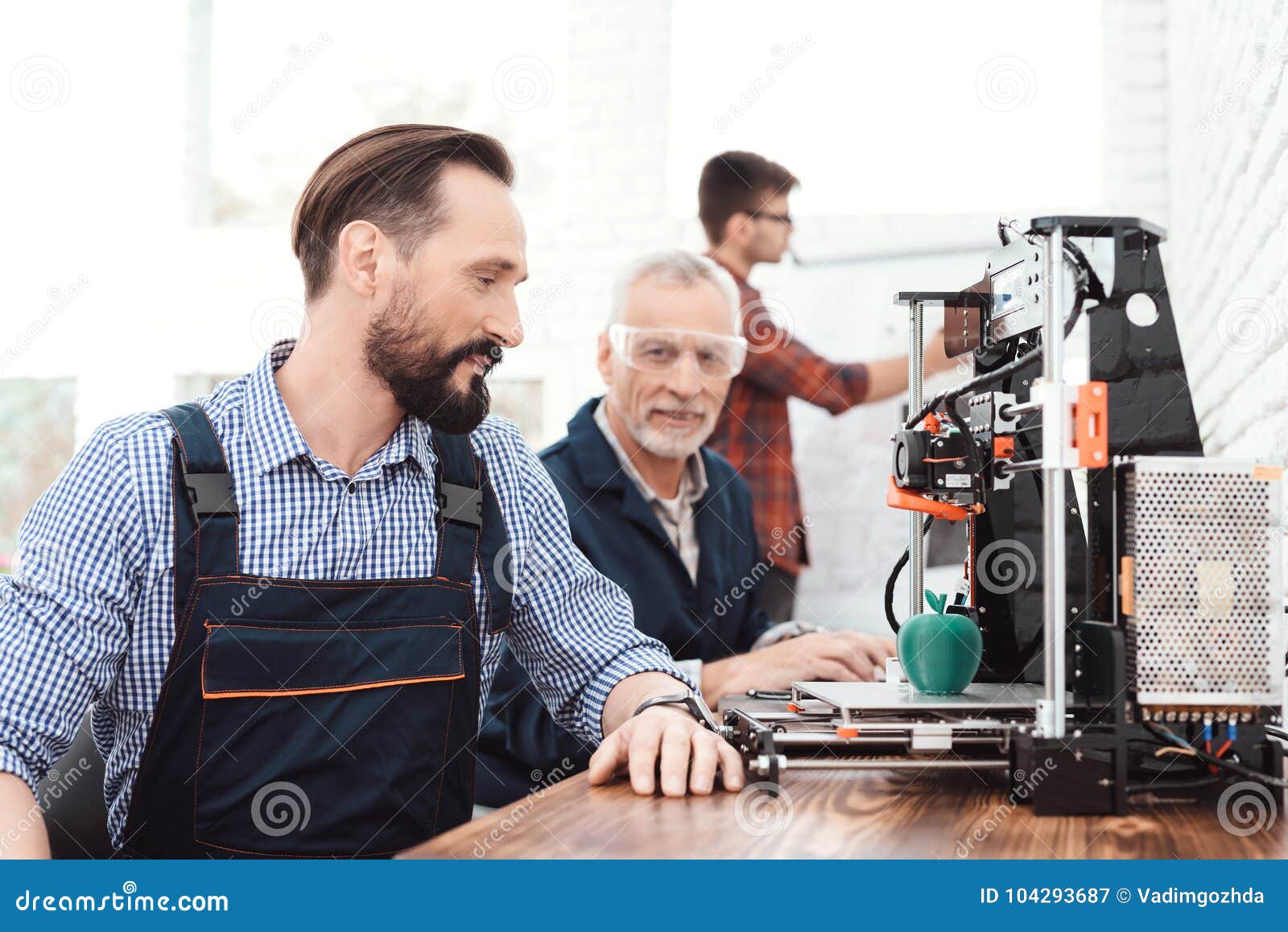 An Engineer in a Working Overall Posing in a Technical Laboratory ...
