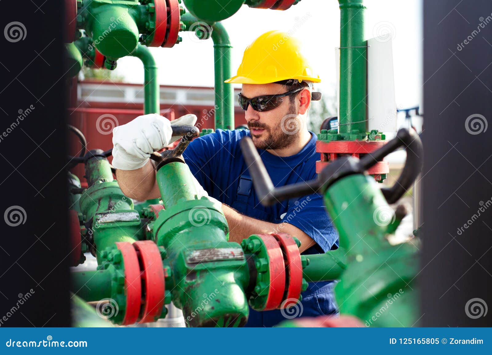 Engineer, Working with Pipeline Controls Inside Oil and Gas Refinery ...