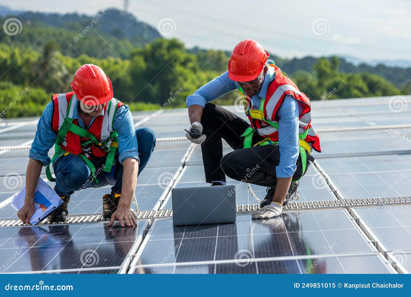 Engineer Working Setup Solar Panel at the Roof Top. Engineer or Worker ...