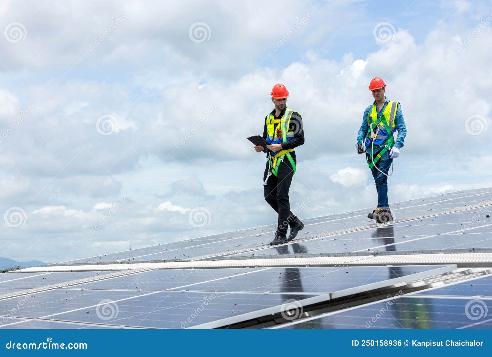 Engineer Working Setup Solar Panel at the Roof Top. Engineer or Worker ...