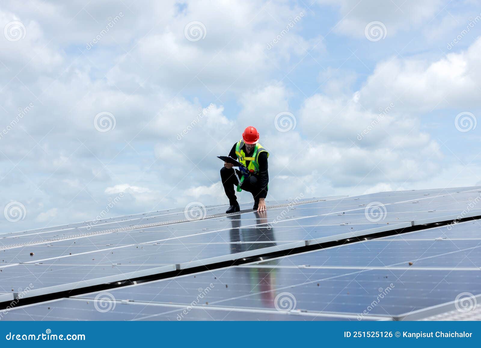 Engineer Working Setup Solar Panel at the Roof Top. Engineer or Worker ...