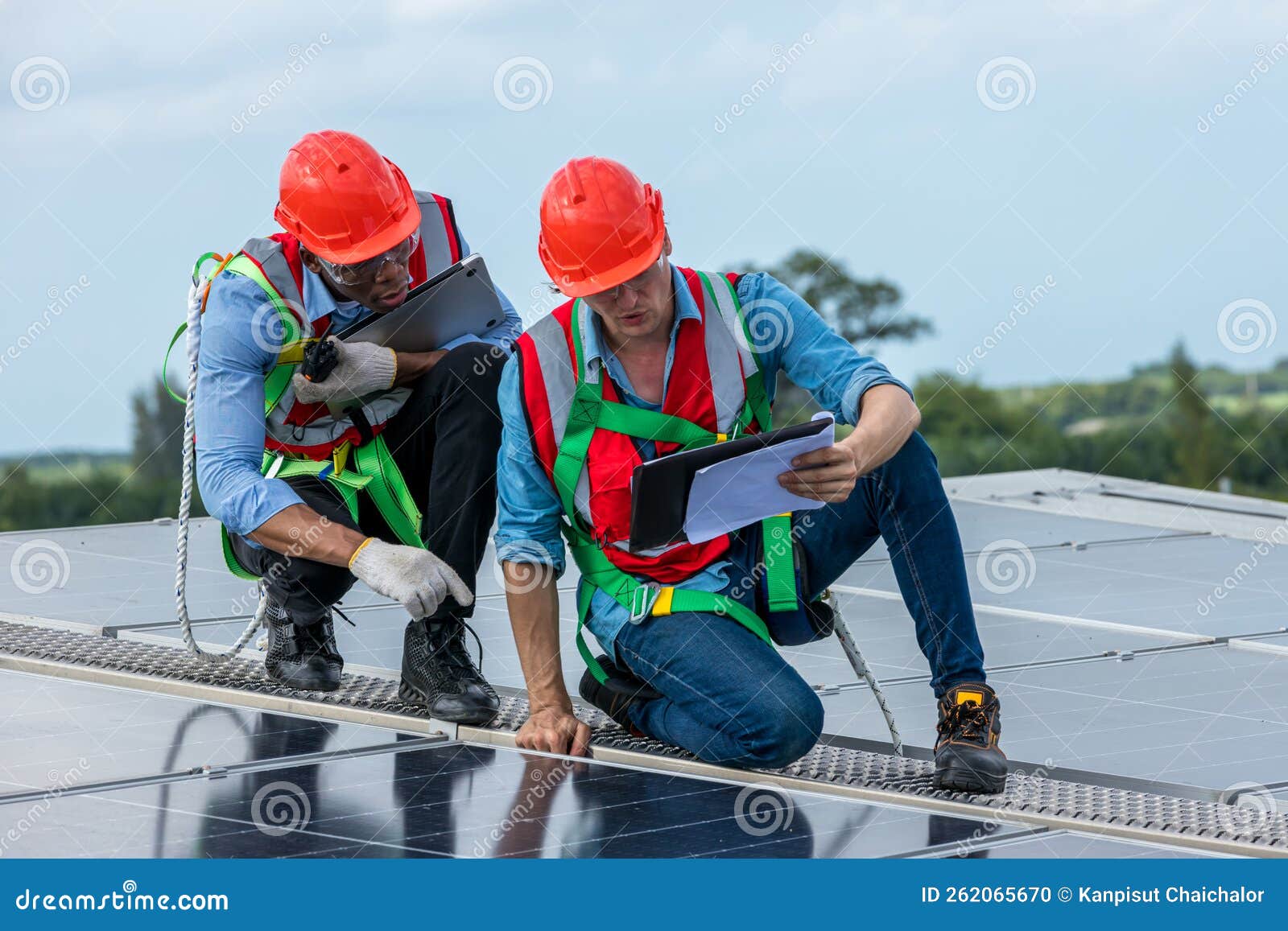 Engineer Working Setup Solar Panel at the Roof Top. Engineer or Worker ...