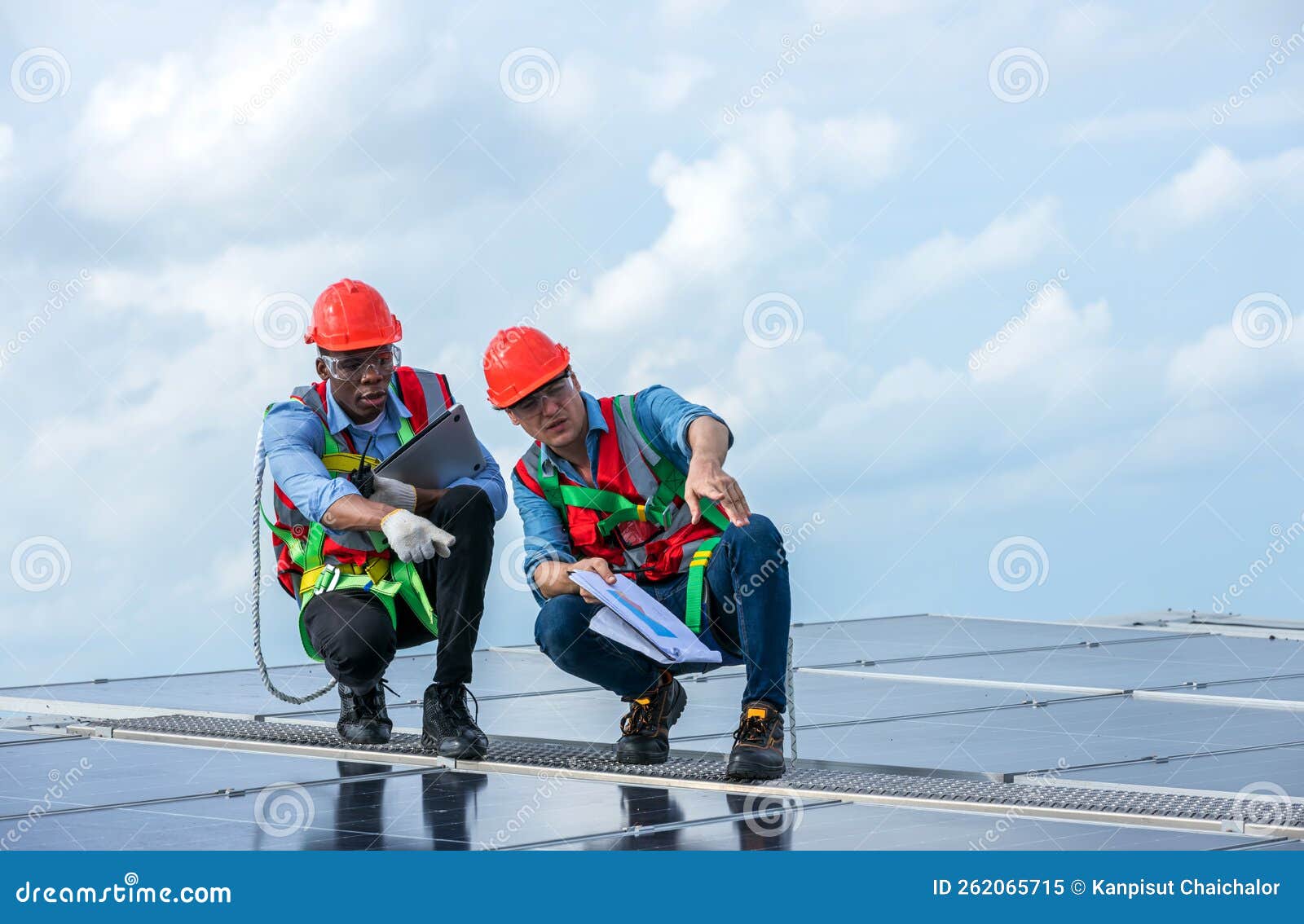 Engineer Working Setup Solar Panel at the Roof Top. Engineer or Worker ...