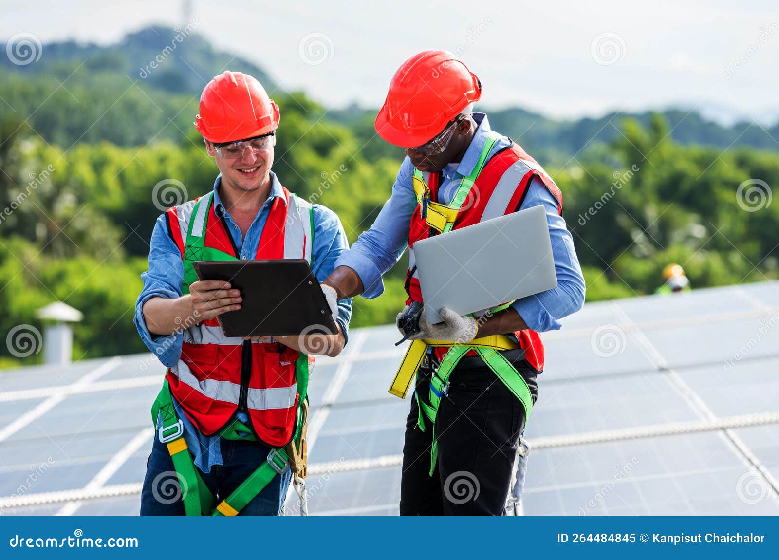 Engineer Working Setup Solar Panel at the Roof Top. Engineer or Worker ...