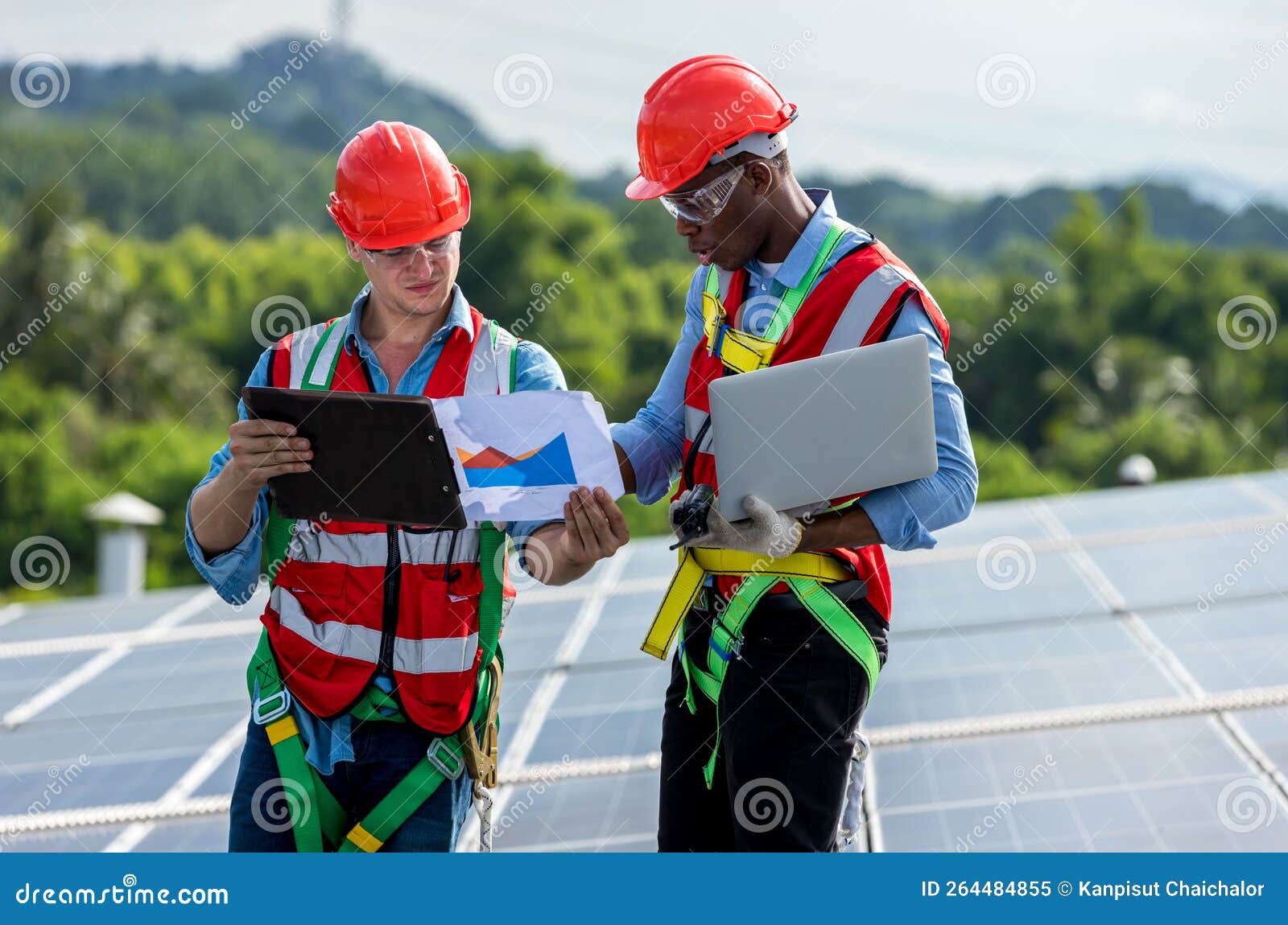 Engineer Working Setup Solar Panel at the Roof Top. Engineer or Worker ...