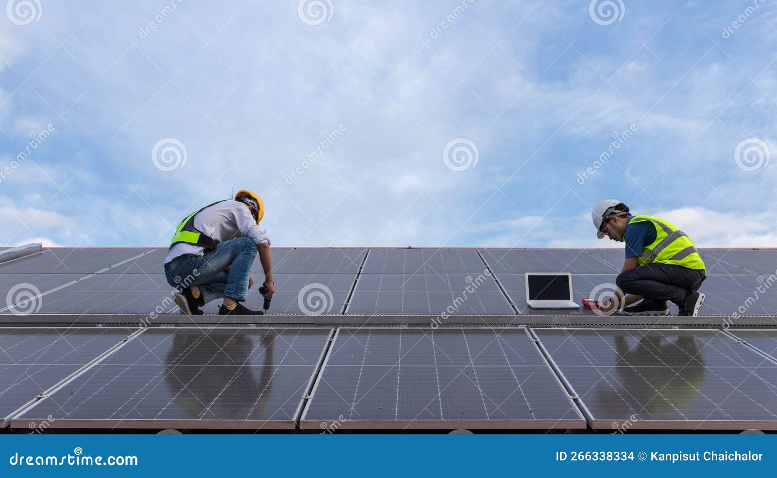 Engineer Working Setup Solar Panel at the Roof Top. Engineer or Worker ...