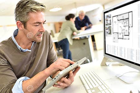 Engineer Working with Tablet and Computer Stock Photo - Image of ...