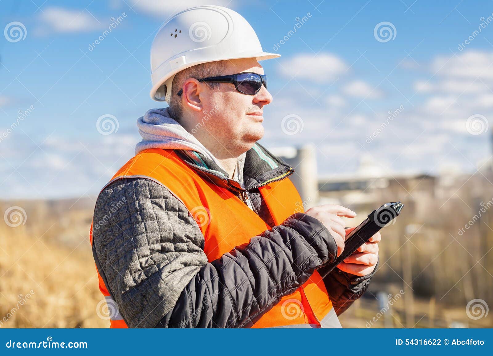 Engineer Working with Tablet PC at Outdoors Stock Photo - Image of ...