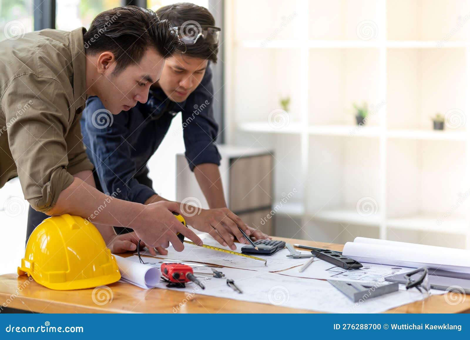 Engineer Working Together Draw Calculate Plan a Construction Project ...