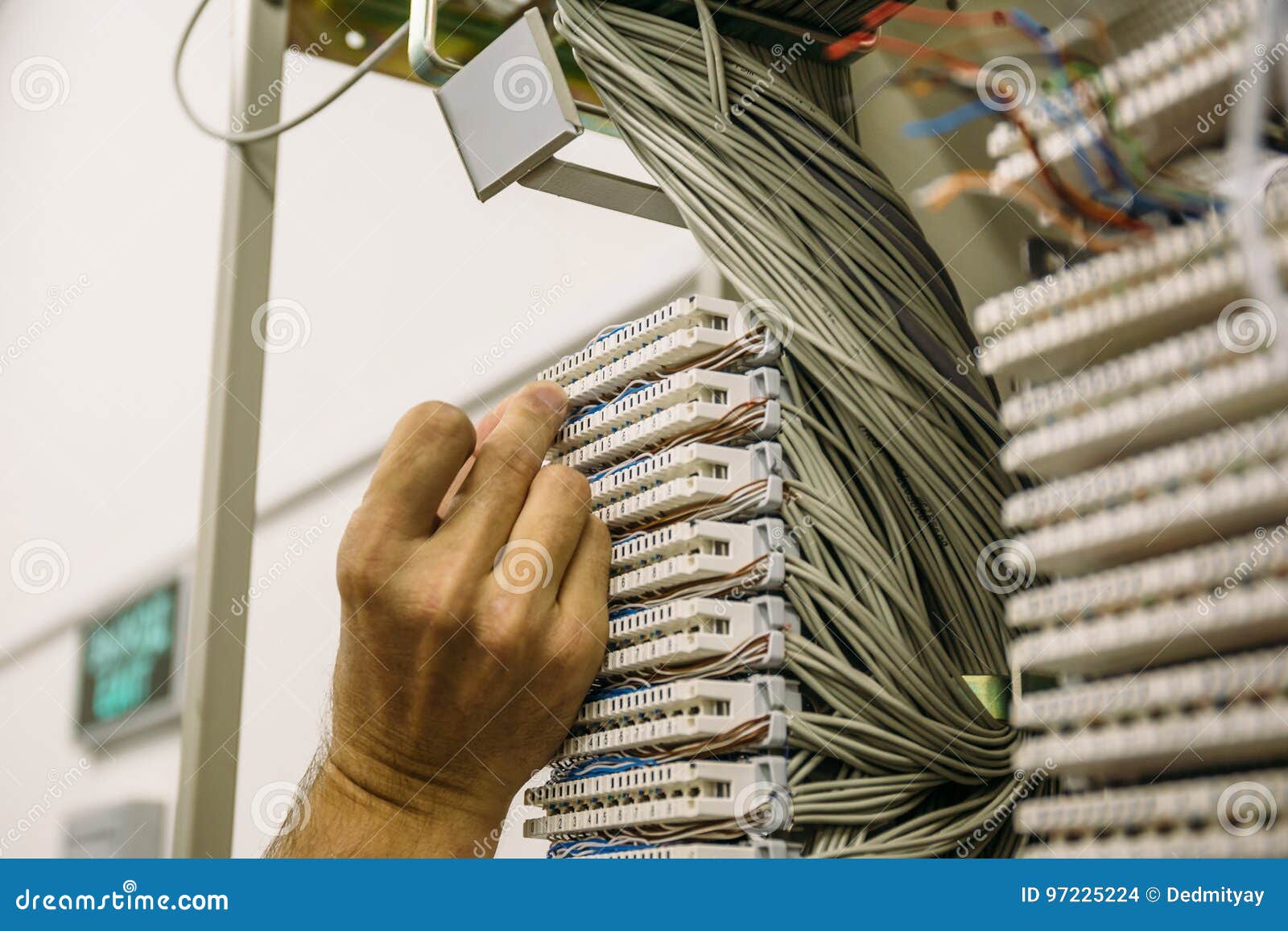 Engineer Works in Data Center with Cables and Switches Stock Photo ...