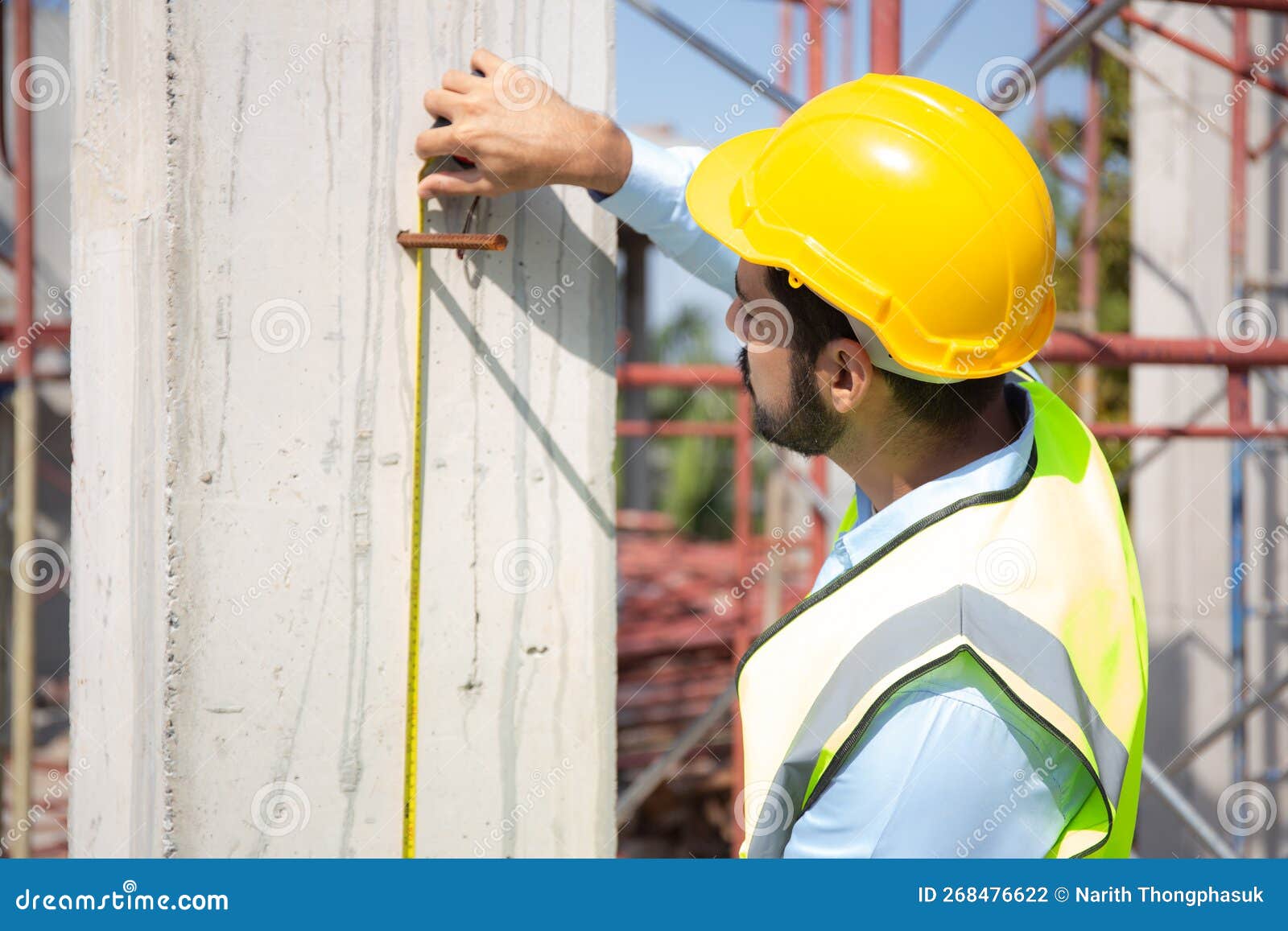 Engineer Young Man Using Tape Measure for Check and Examining Length of ...