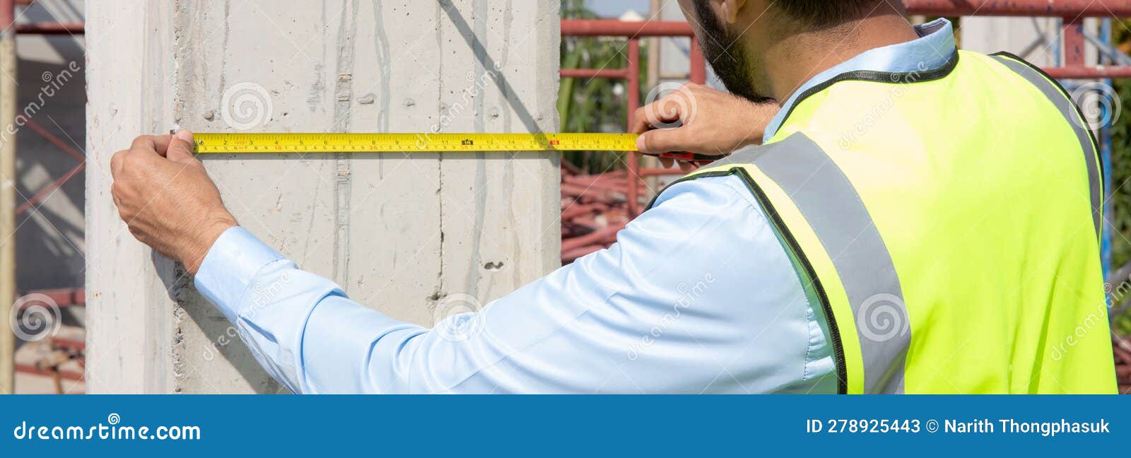Engineer Young Man Using Tape Measure for Check and Examining Length of ...