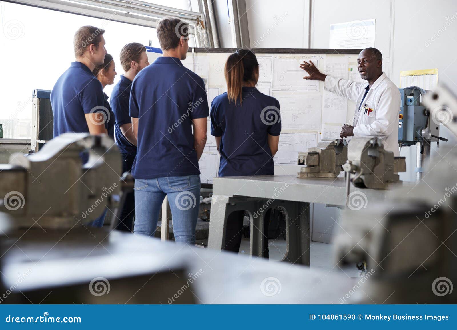 Engineering Apprentices Watching Presentation at Whiteboard Stock Photo ...