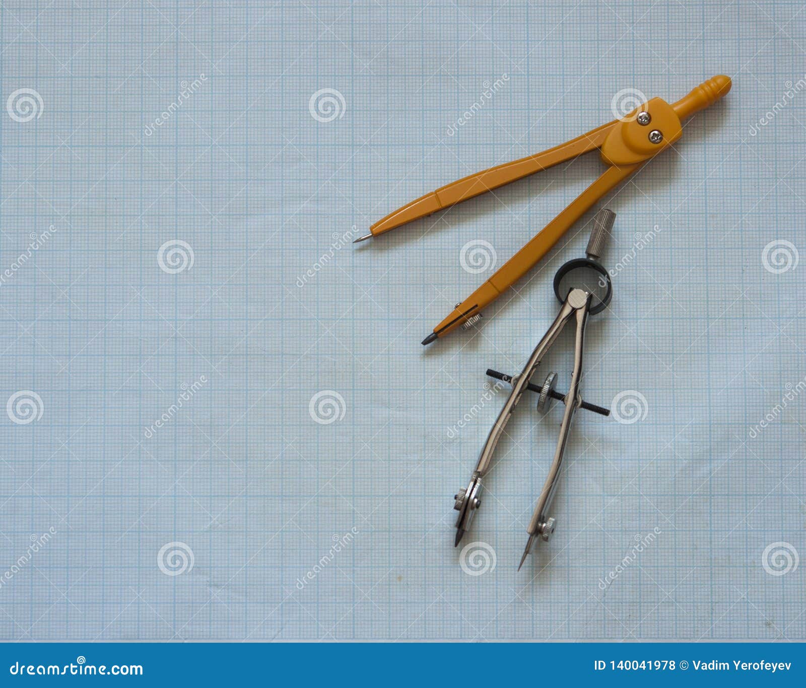 Engineering Concept. Divider on Graph Paper Background Stock Photo ...