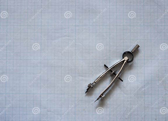 Engineering Concept. Divider on Graph Paper Background Stock Image ...