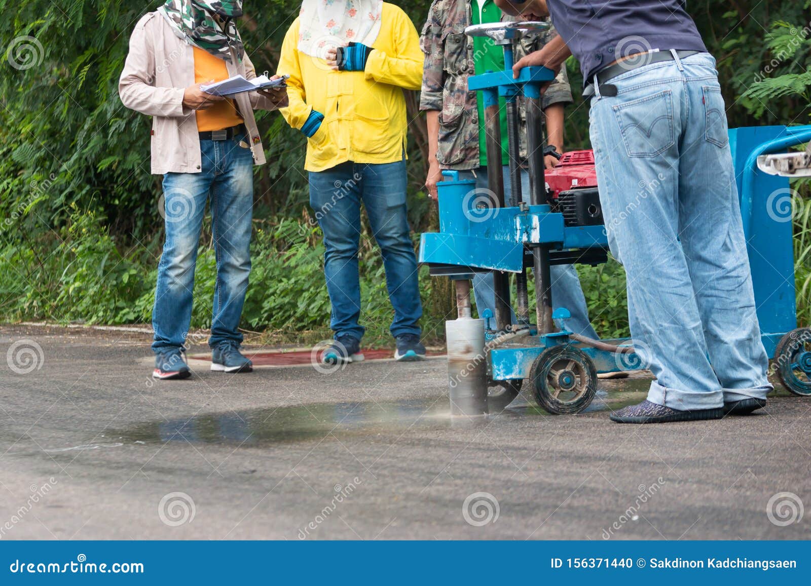 Engineering is Drilling the Road by Road Drilling Machine Stock Photo ...