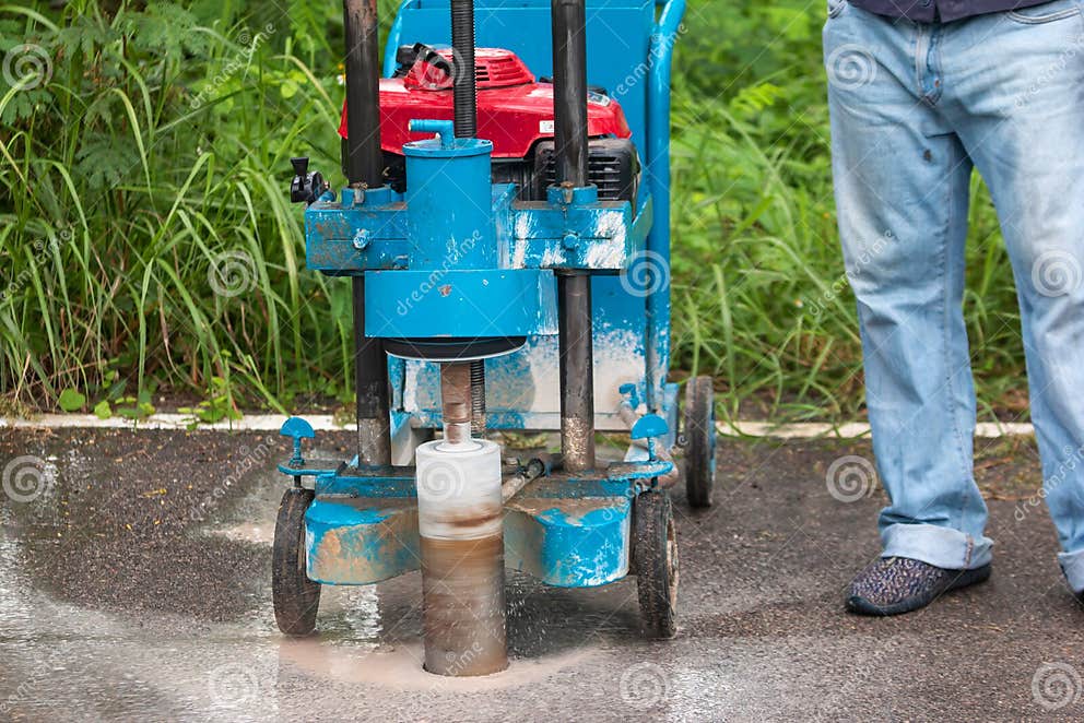 Engineering is Drilling the Road by Road Drilling Machine Stock Image ...