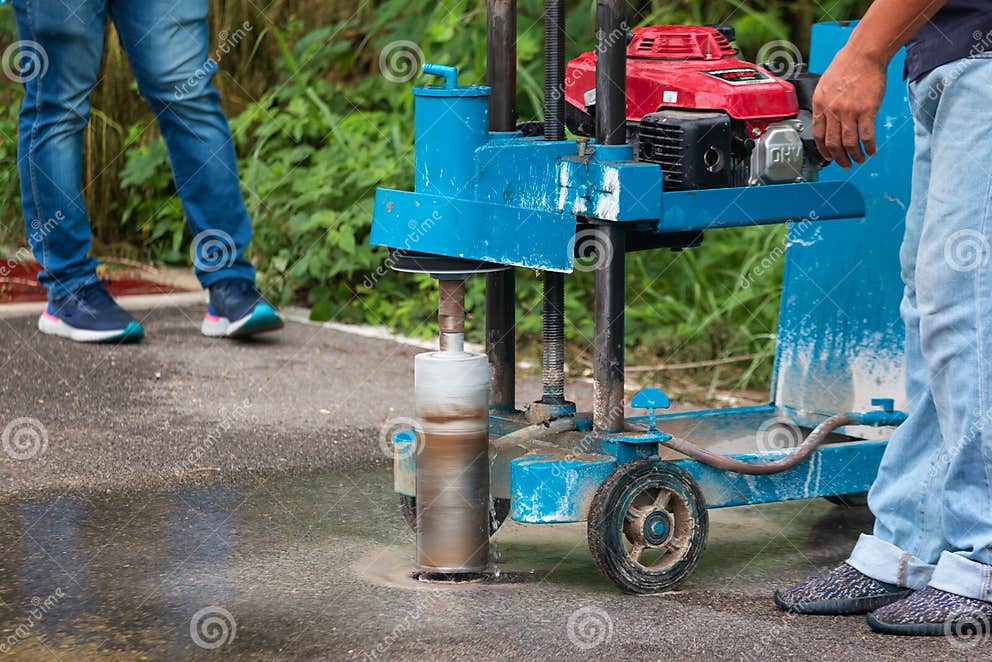 Engineering is Drilling the Road by Road Drilling Machine Stock Image ...