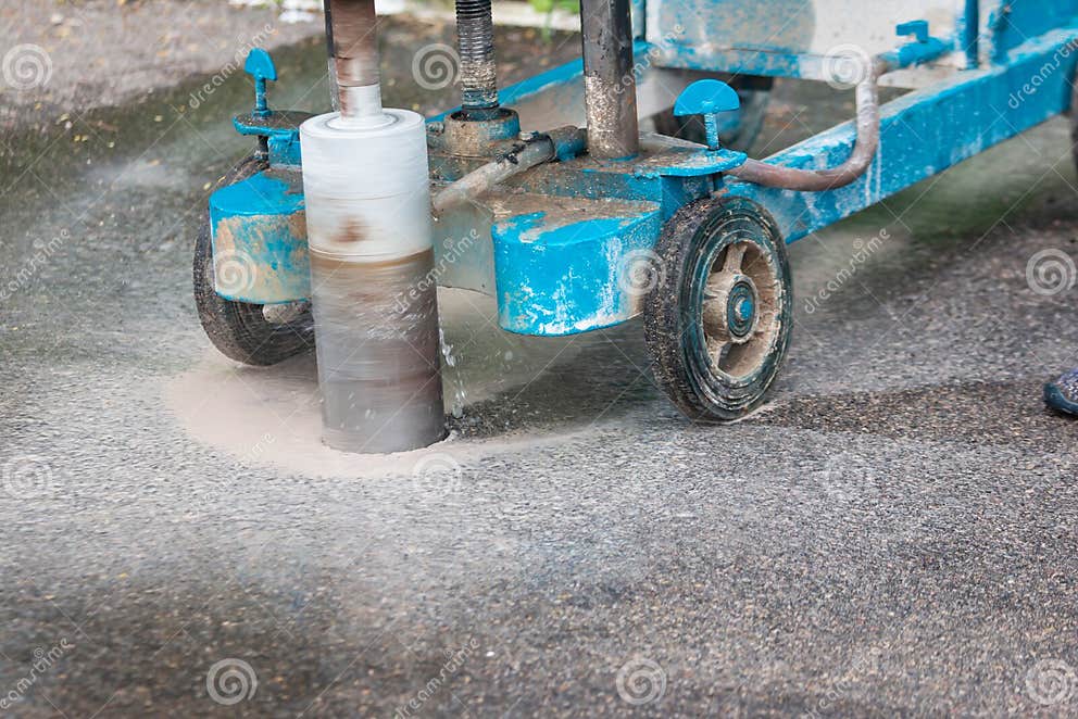 Engineering is Drilling the Road by Road Drilling Machine Stock Photo ...