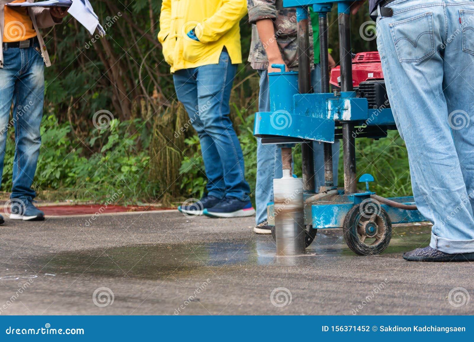 Engineering is Drilling the Road by Road Drilling Machine Stock Photo ...