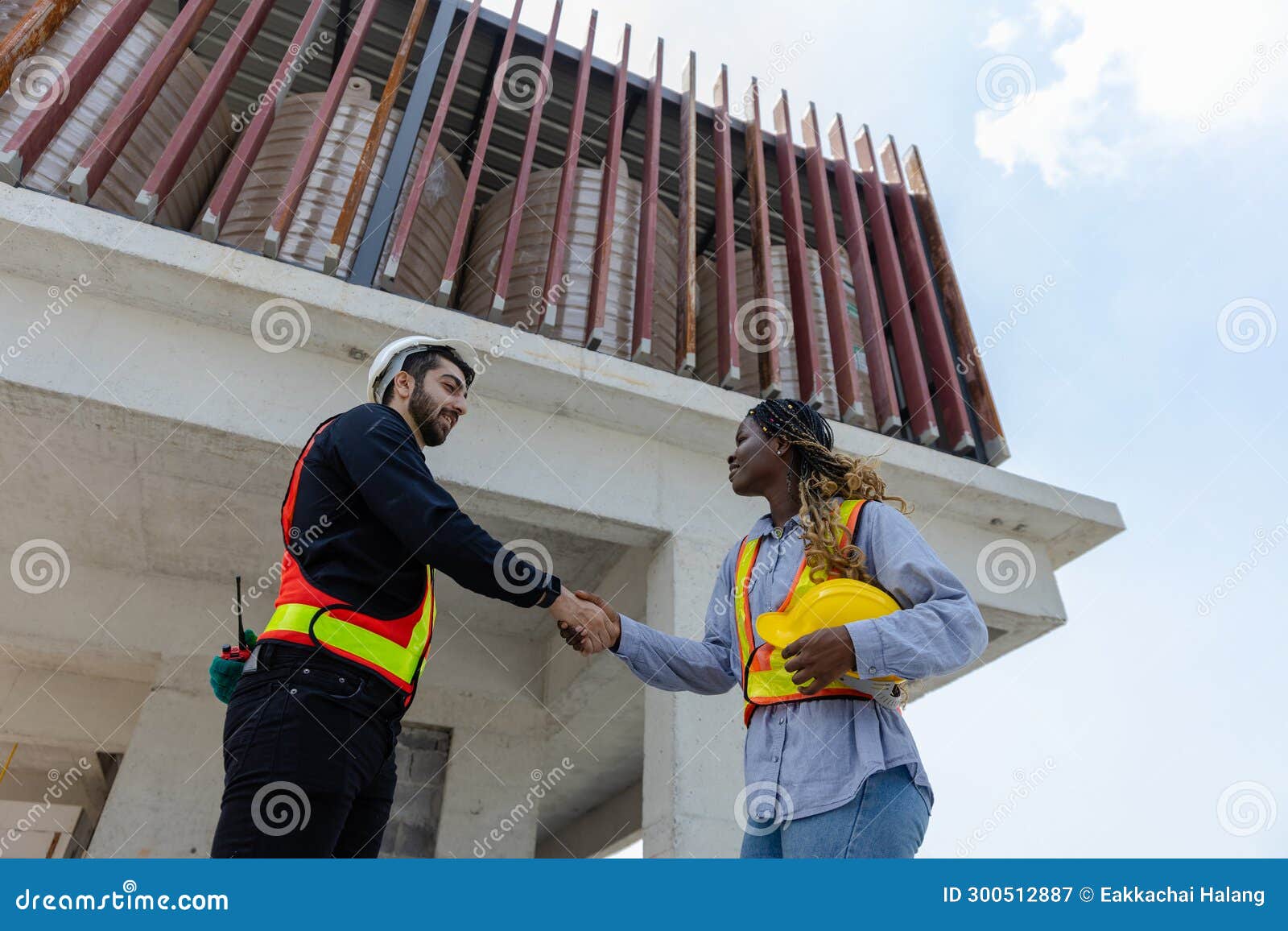 Engineering and Foreman Shaking Hands on Construction Site and Agree ...