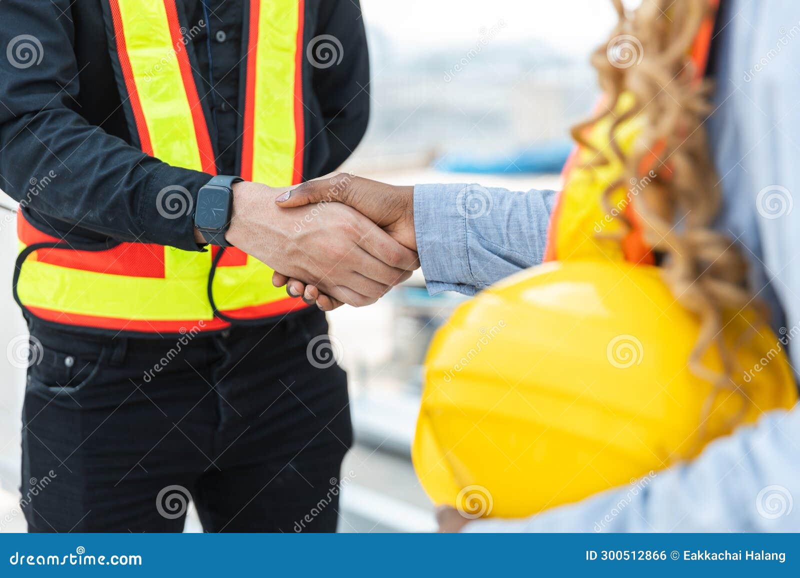 Engineering and Foreman Shaking Hands on Construction Site and Agree ...