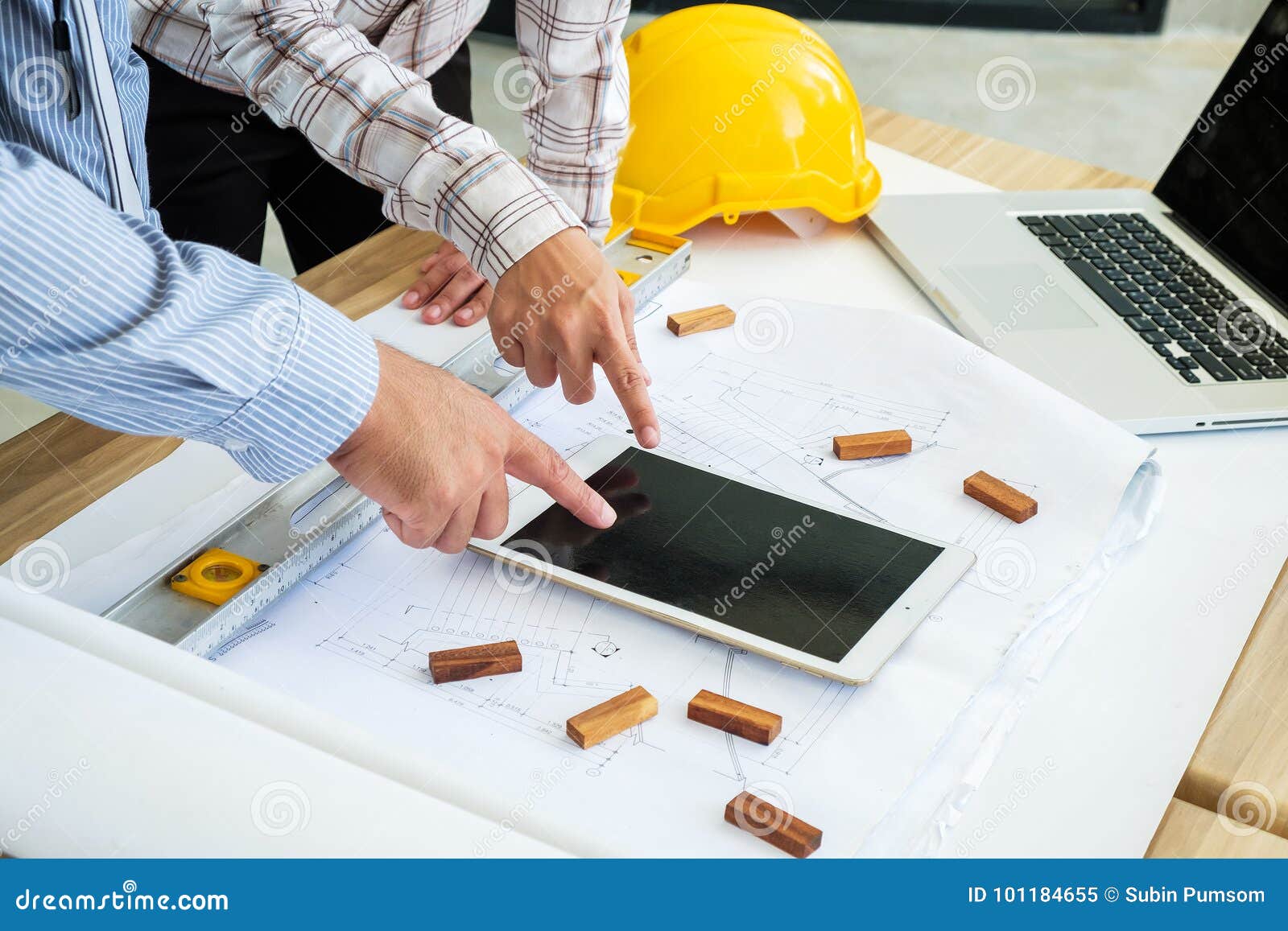 Engineering is Looking Tablet on a Blueprint. To Prepare for Fie Stock ...