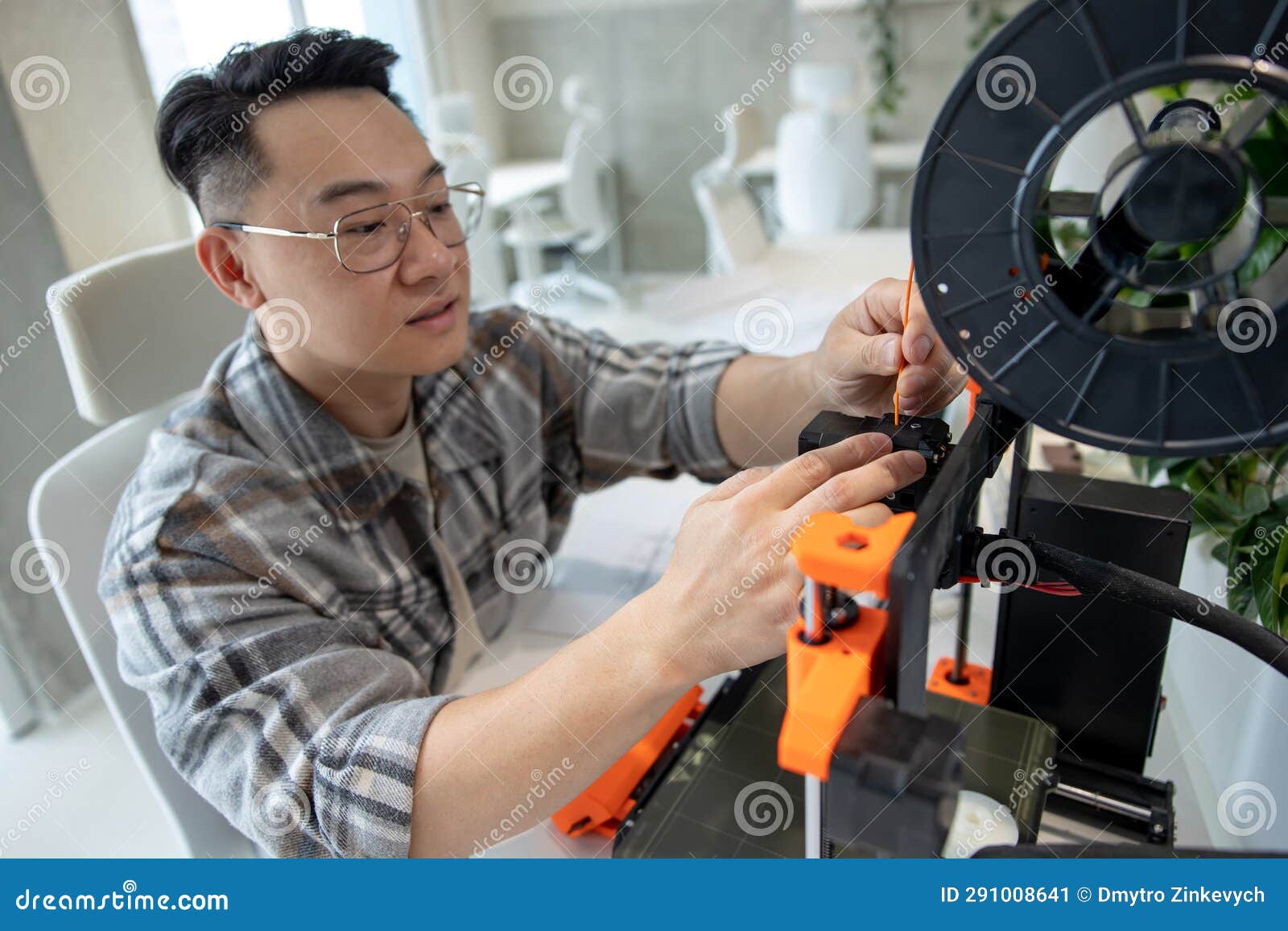 Engineering Man Designing Mechanical Parts Using 3D Printer in Office ...