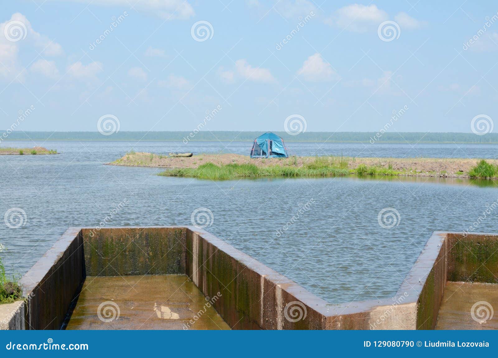 Engineering Structures on the Shore of a Large Pond Stock Photo - Image ...