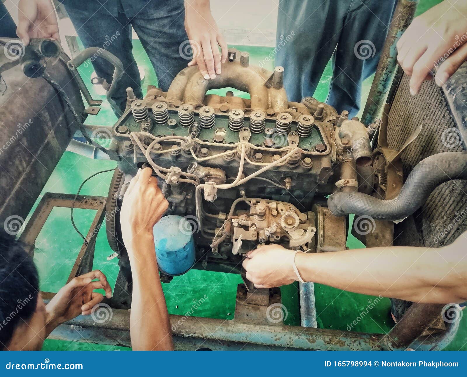 Engineering Student Learning To Disassemble the 4-cylinder Diesel ...