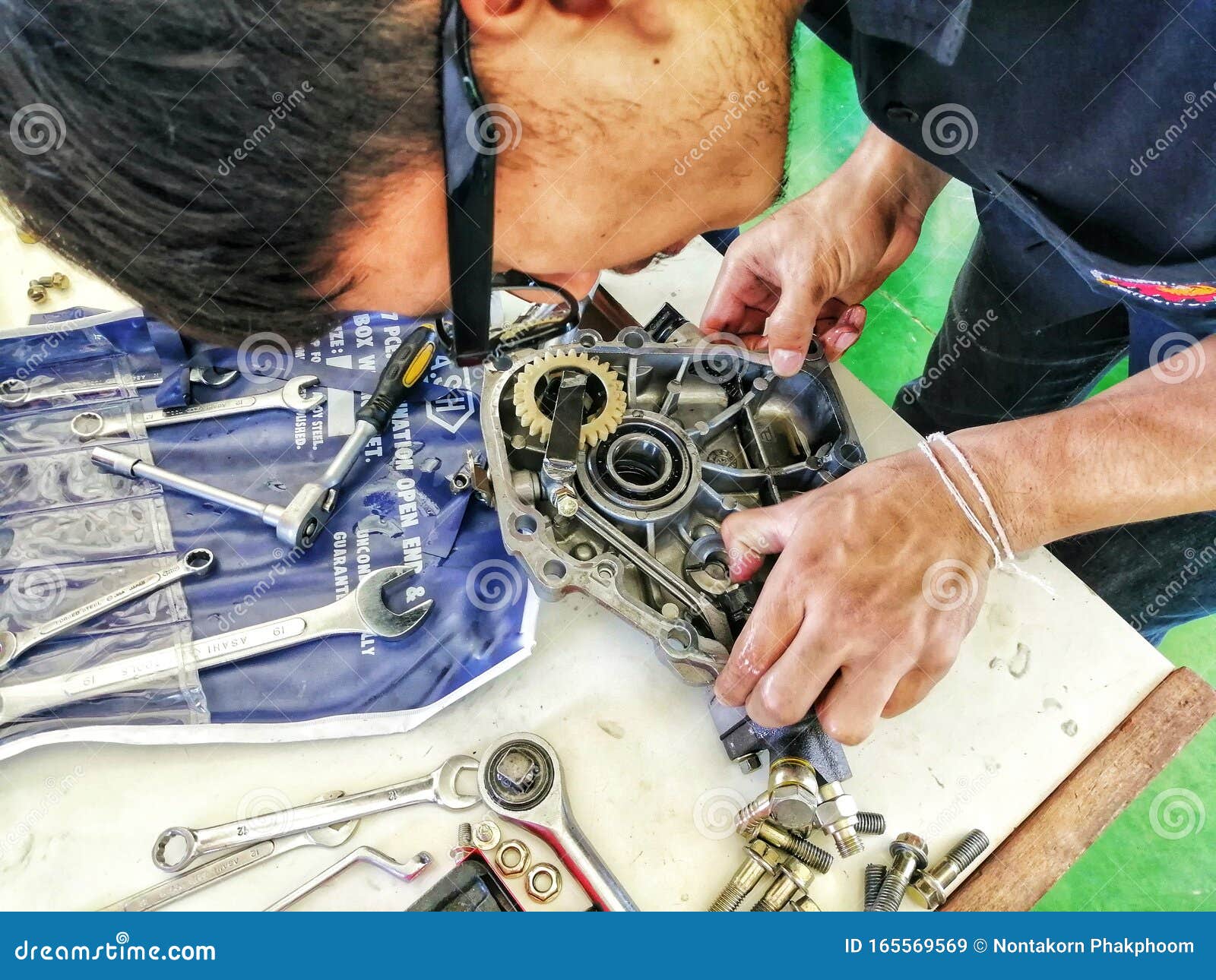 Engineering Student Learning To Disassemble the 4-cylinder Diesel ...