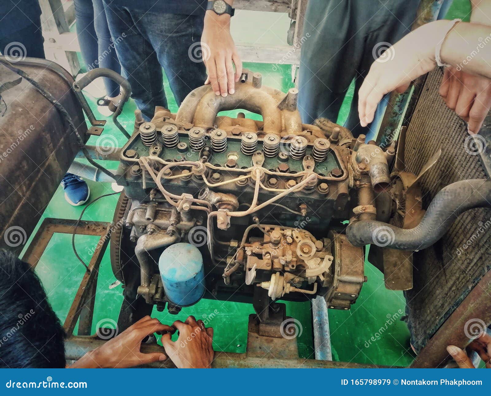 Engineering Student Learning To Disassemble the 4-cylinder Diesel ...