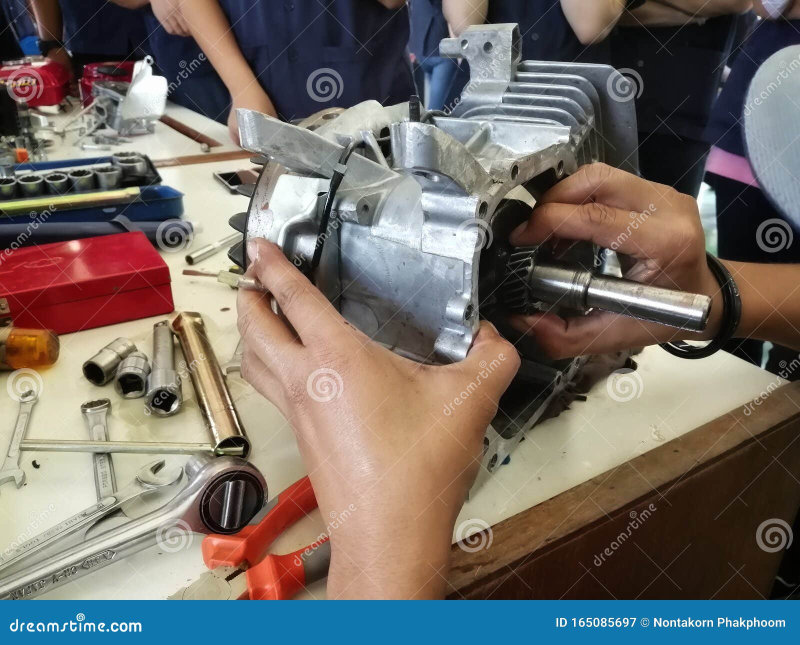 An Engineering Student is Studying a Disassembling Benzyl Engine ...