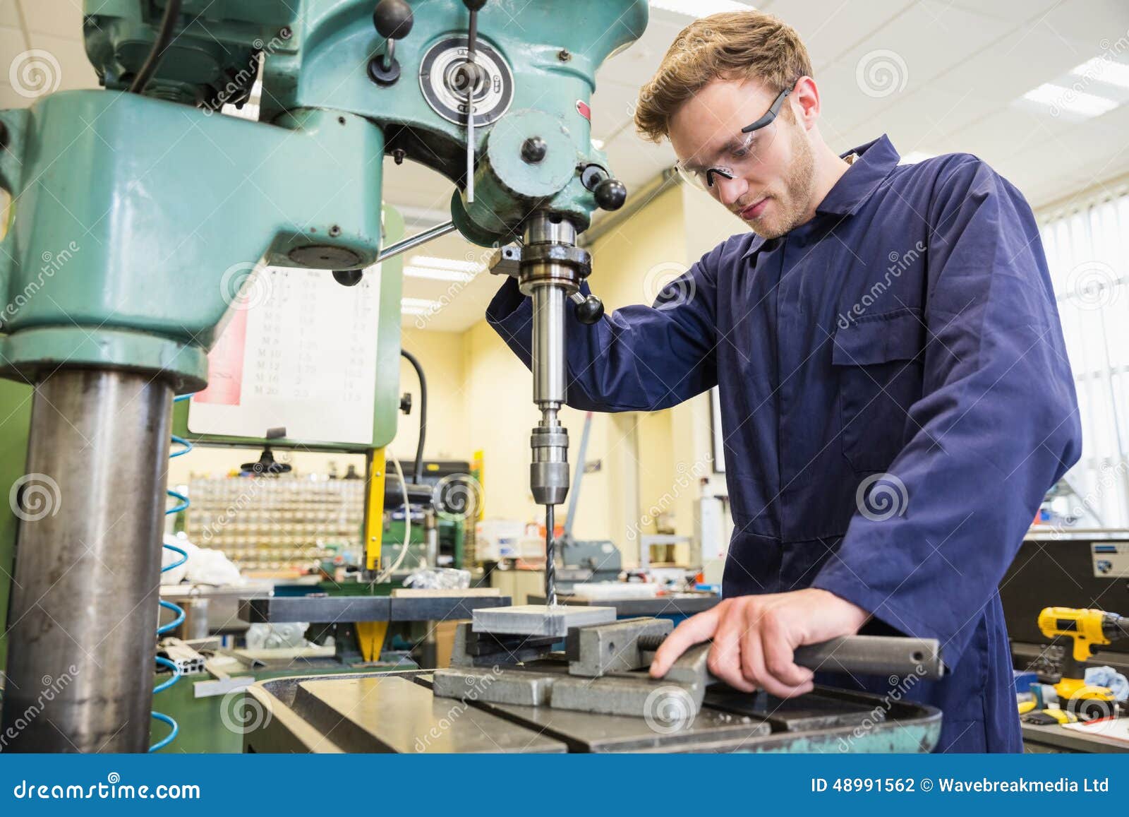 Engineering Student Using Large Drill Stock Photo - Image of indoors ...