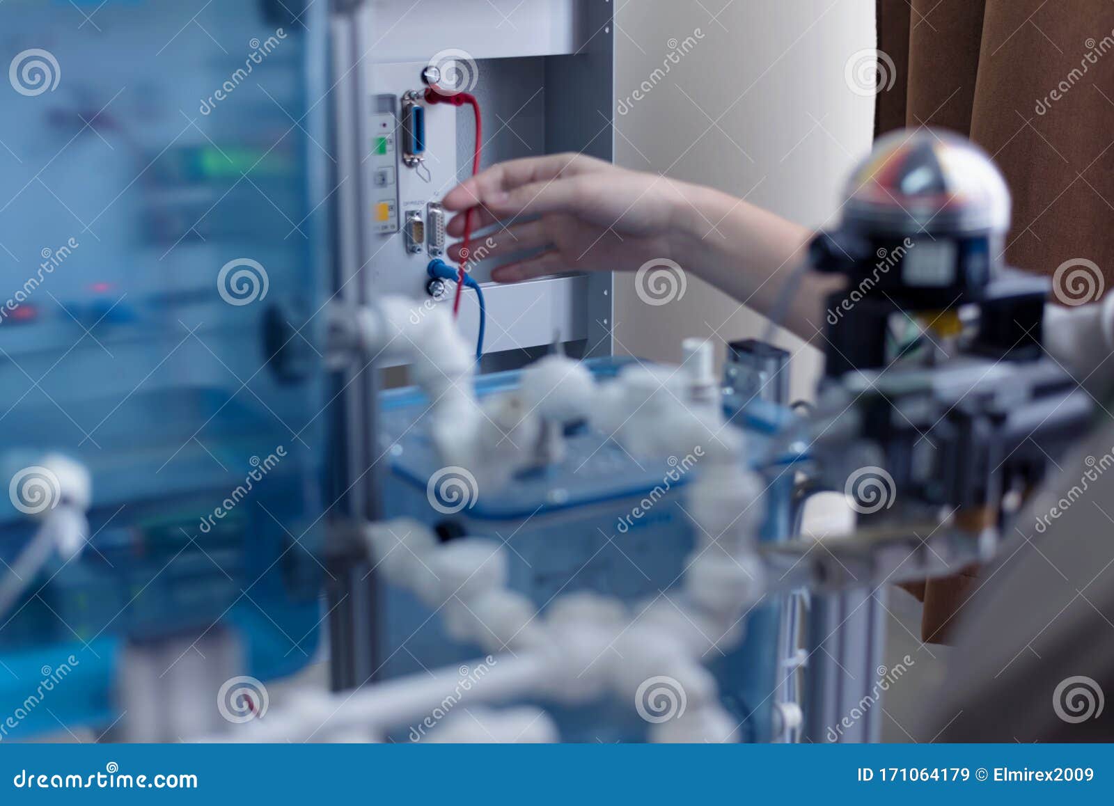 Engineering Students Working in the Lab. Students are Adjusting an ...