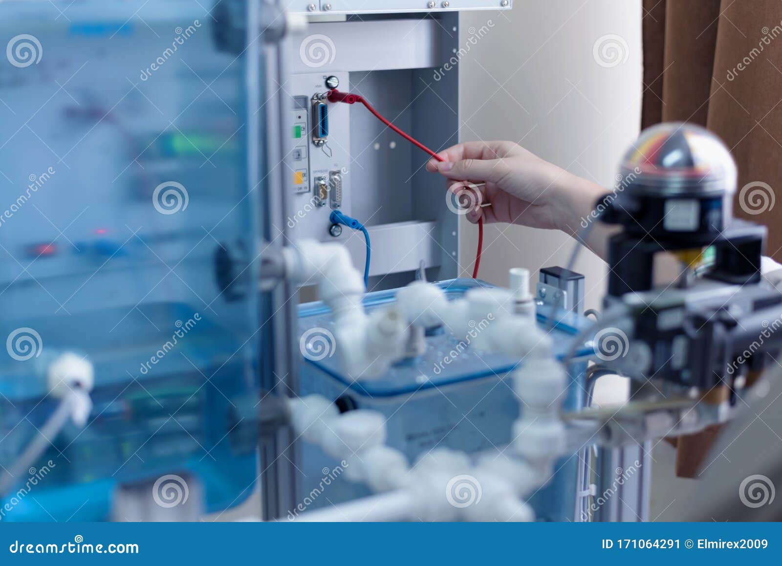 Engineering Students Working in the Lab. Students are Adjusting an ...