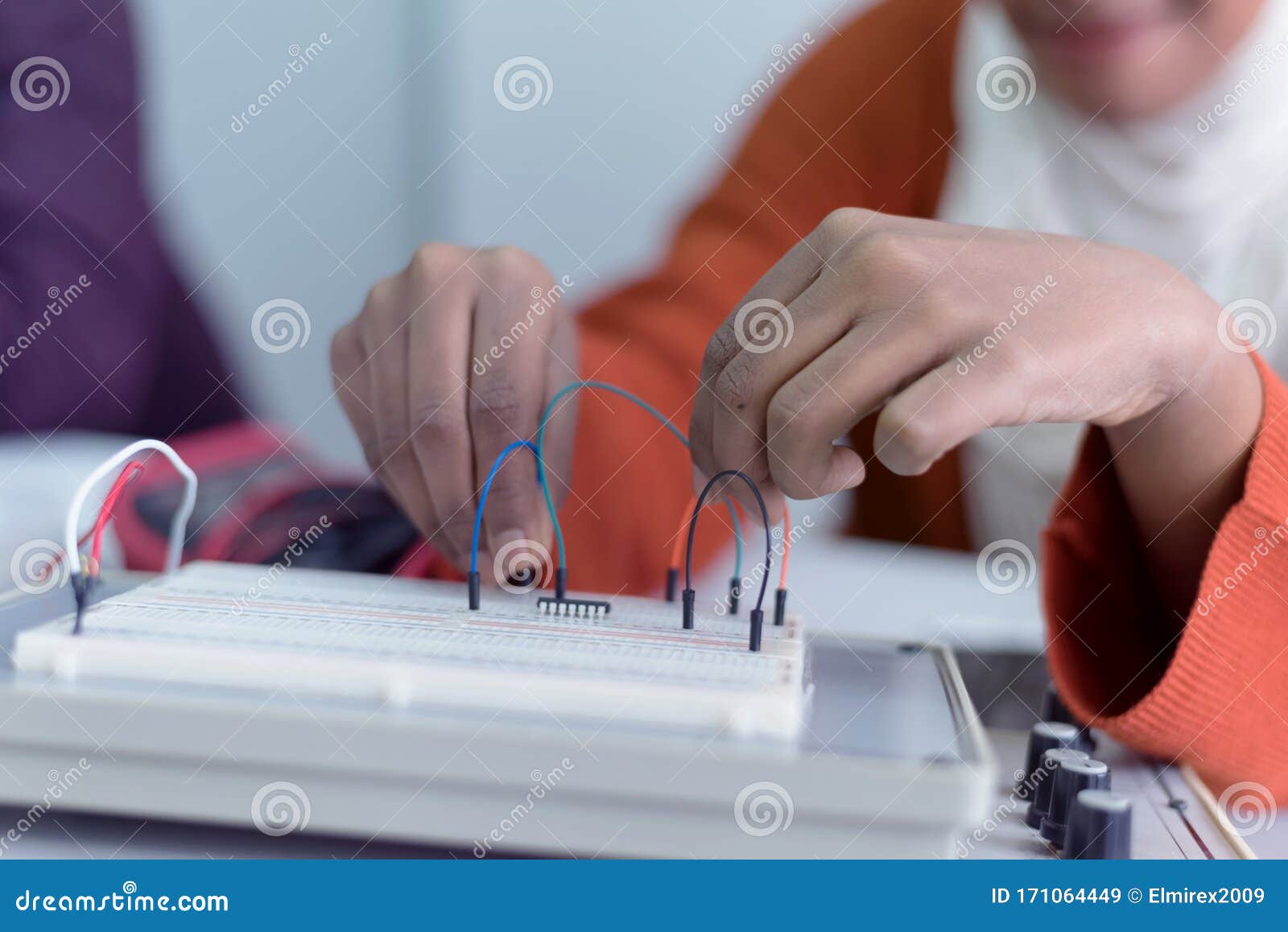 Engineering Students Working in the Lab. Students are Adjusting an ...
