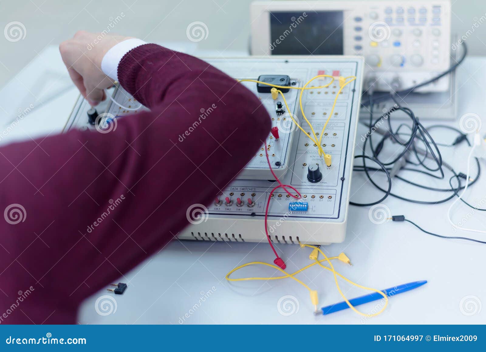 Engineering Students Working in the Lab. Students are Adjusting an ...
