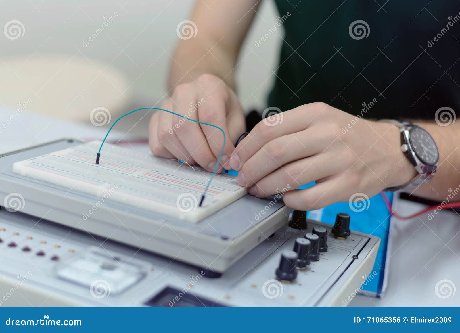 Engineering Students Working in the Lab. Students are Adjusting an ...