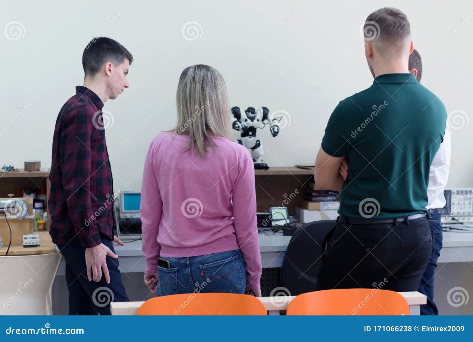 Engineering Students Working in the Lab. Students are Adjusting an ...