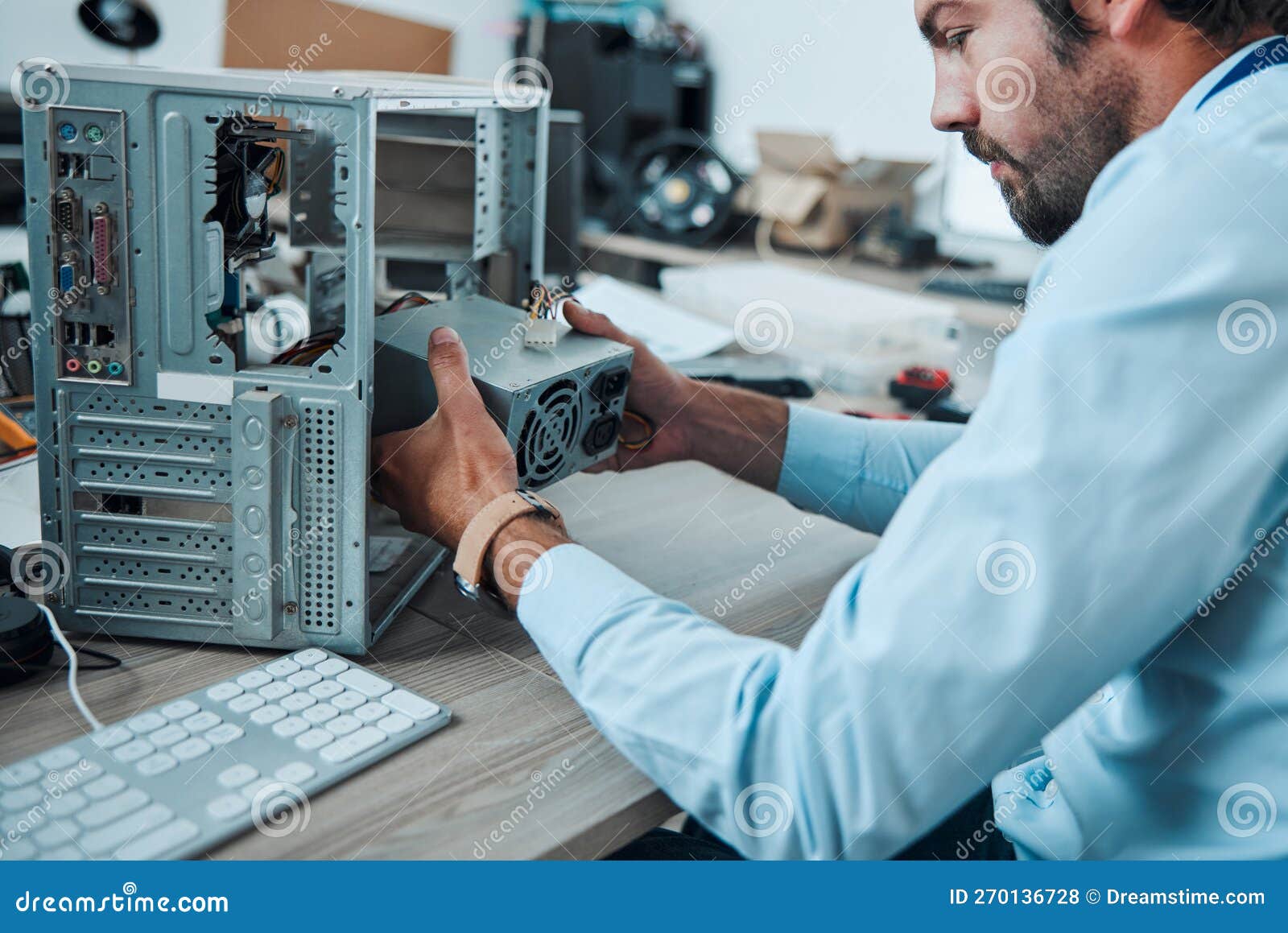 Engineering, Technician and Man Fixing the Hardware of a Computer in ...