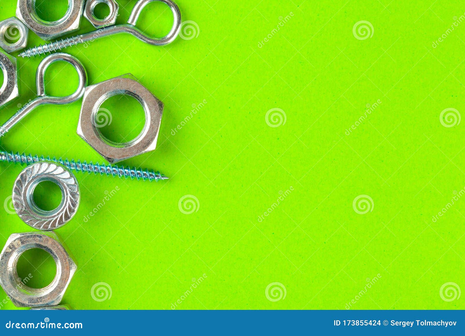 Engineering Tools. Bolts and Nuts on Green Background Stock Photo ...