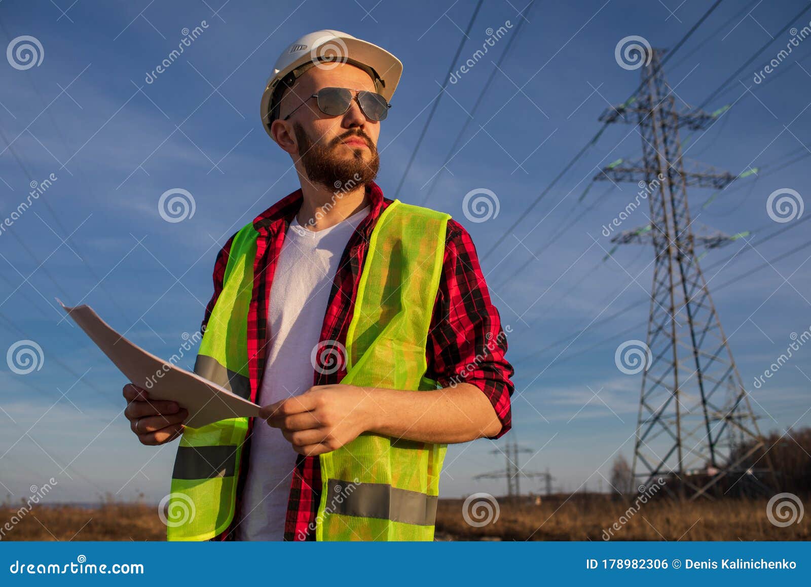 Engineering Working on High-voltage Tower, Check the Information on ...