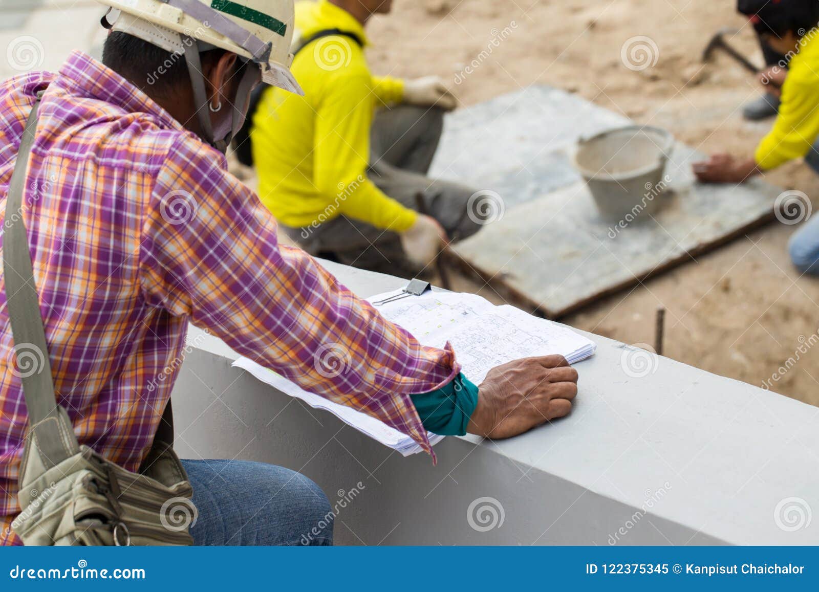 Engineers on Building Site Checking Plans. Engineer or Architect of ...